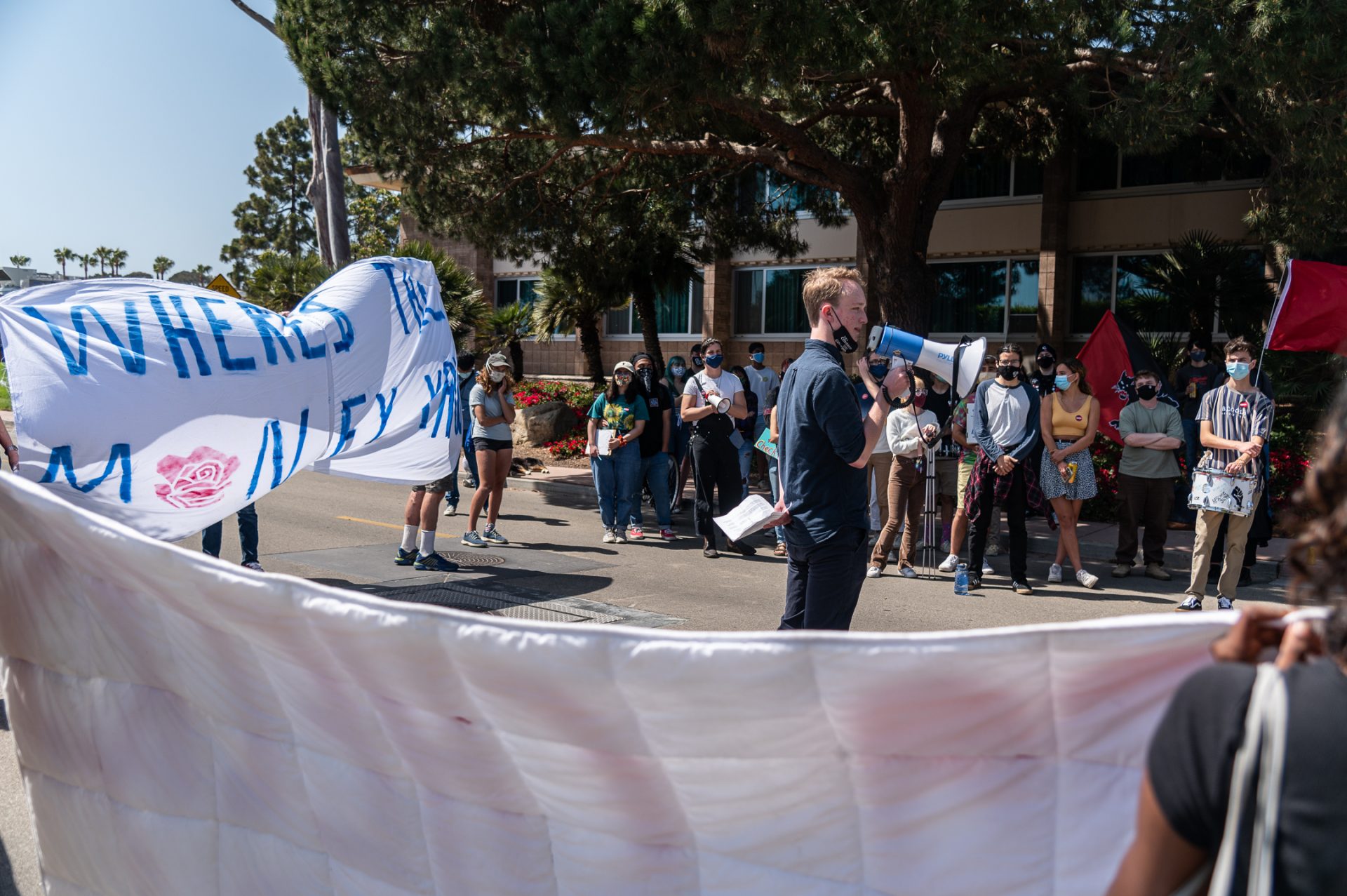 In Photos – YDSA March for COVID Relief Checks | THE BOTTOM LINE